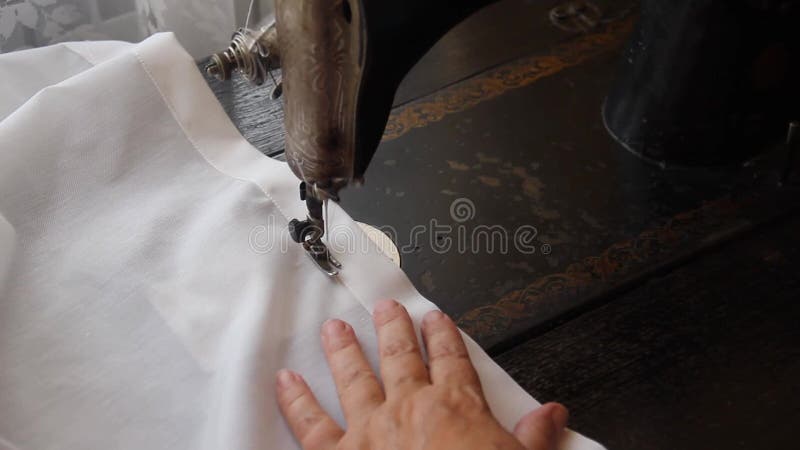 Hands of an Old Woman Scribbling White Cloth on an Old Manual Sewing ...