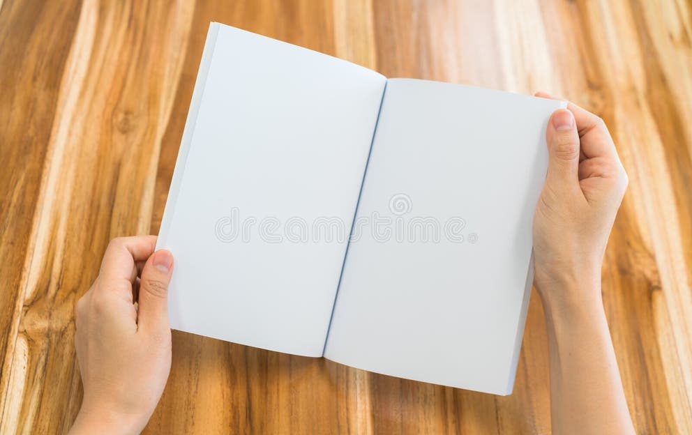 Hands Open Book on Wood Table . Stock Photo - Image of girl, table ...