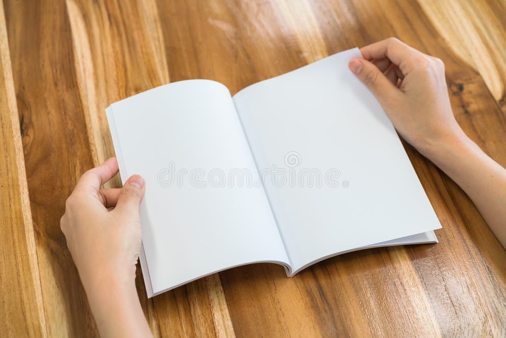 Hands Open Book on Wood Table . Stock Image - Image of hand, paper ...
