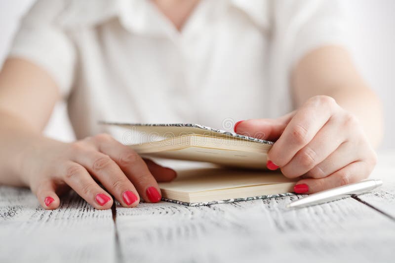 Hands Open Notebook on Wood Table Stock Image - Image of paper, person ...