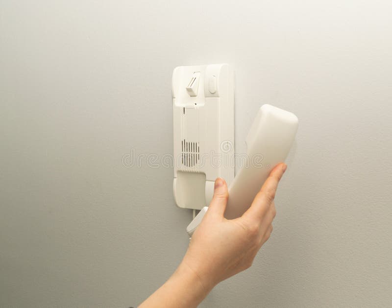 Hands Opening Door through Intercom Stock Photo - Image of entry, door ...
