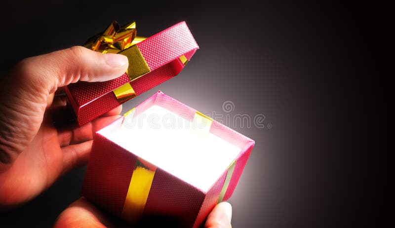 Hands Opening a Red Gift Box with Ribbon in Shadow Stock Image - Image ...