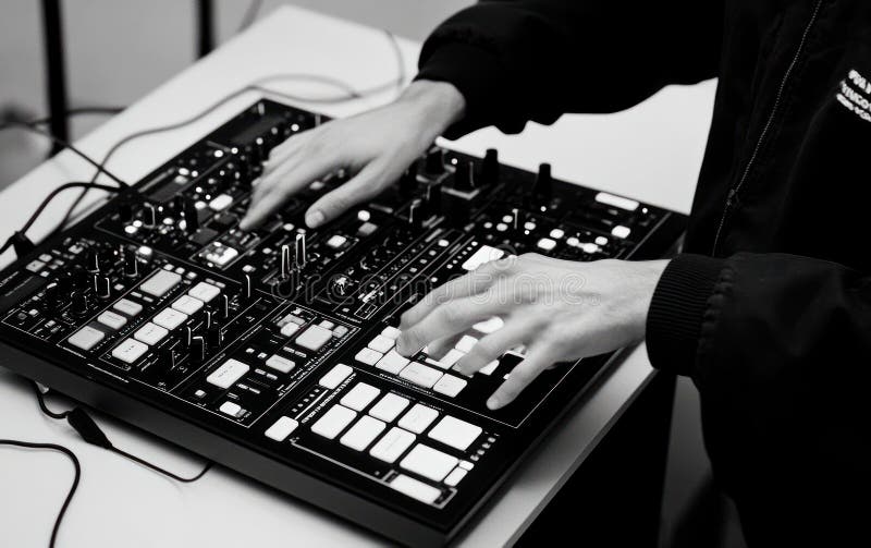 Hands Operating a Music Production Controller in Black and White Stock ...