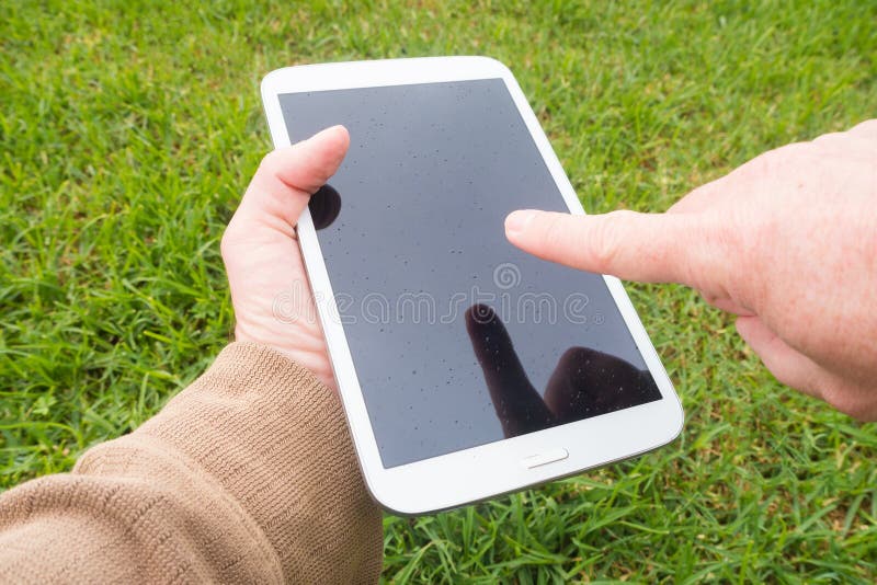 Hands Operating Tablet in Wet Weather Stock Image - Image of blank ...