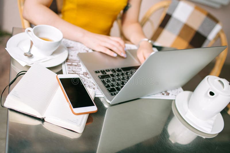 Hands Over Laptop with Smartphone Notepad and Tea in Cafe Stock Image ...
