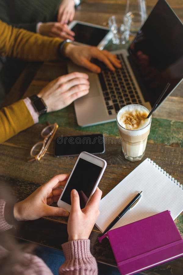 Hands Over Laptop Smartphone Tablet with Coffee in Trendy Cafe Stock ...