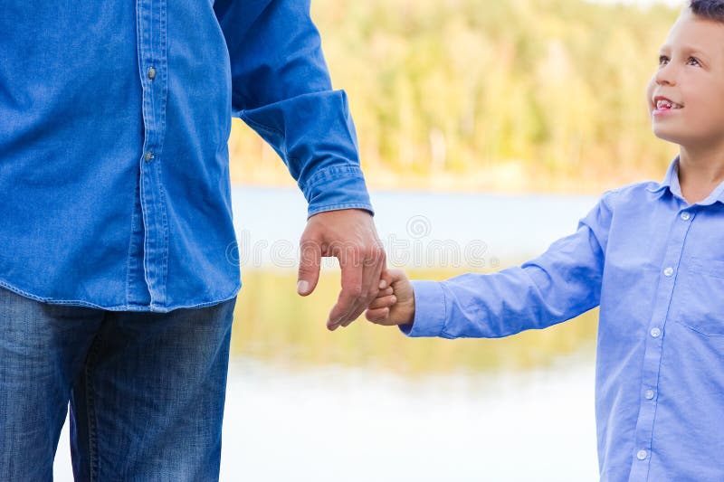 A Hands of Parent and Child in Nature in the Park Travel Stock Photo ...
