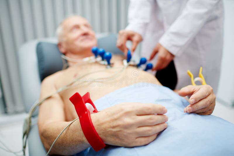 Female Patient Having ECG Electrocardiogram In Hospital. Stock Photo ...