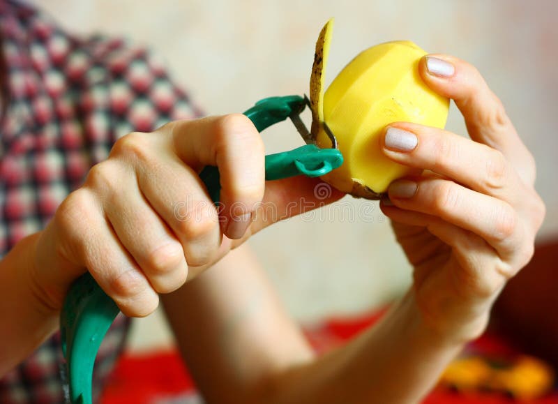 Hands Peeling Potato with Vegetable Cutter Slicer Slicing Machi Stock ...