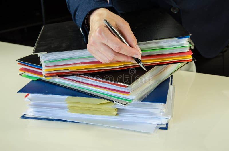 Hands with pen and files stock photo. Image of business - 55470710