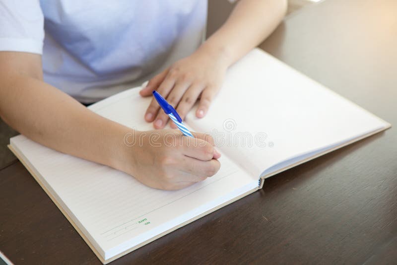 Hands with pen writing stock photo. Image of book, note - 73332632