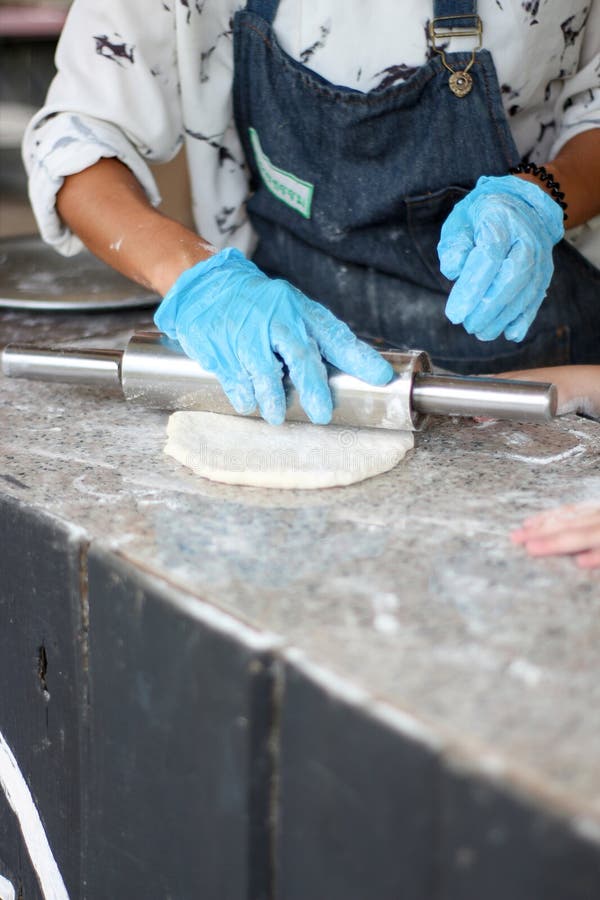 Hands of People Making Dough Sheets Stock Photo - Image of dough ...