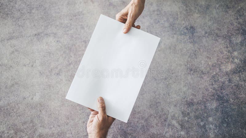 Man Passing Paper Stock Images - Download 405 Royalty Free Photos