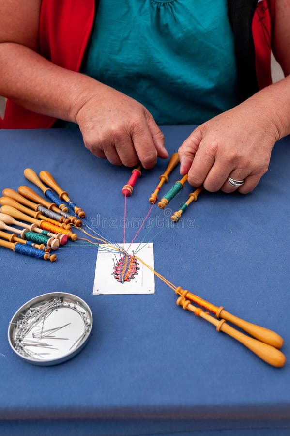 Hands of People Preparing and Making Bobbin Lace. Colorful Lace Threads ...