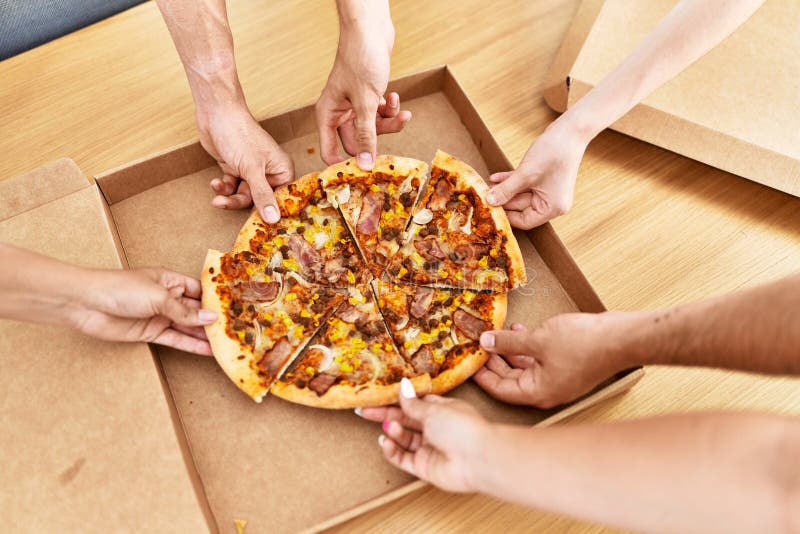 Hands of People Taking Portion of Italian Pizza on the Table at Home ...