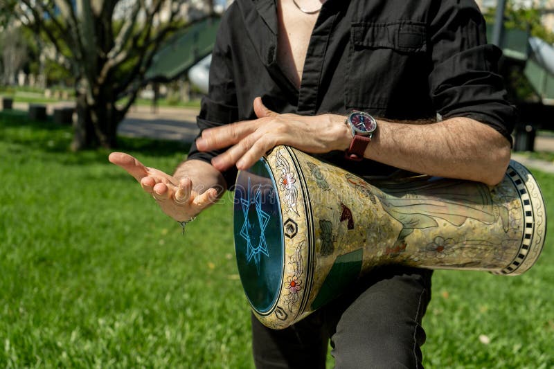 Hands of a Derbakist Playing His Derbake or Darbuka of Arabic Origin ...