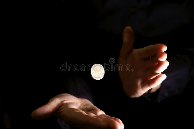 Hands Performing a Trick with a Coin Stock Photo - Image of fingers ...