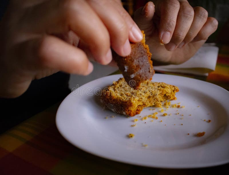 Hands of a Person Eating a Piece of Pie with Crumbs on the Plate Stock ...