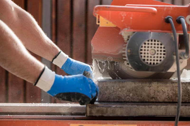 Hands of a Person Using a Circular Saw Stock Image - Image of brick ...