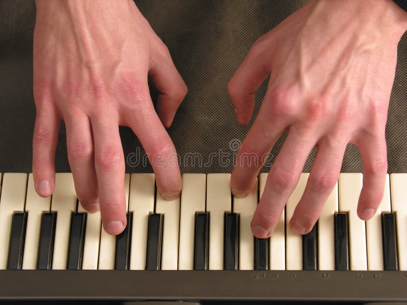 Hands on piano stock image. Image of hand, musical, notes - 2007871