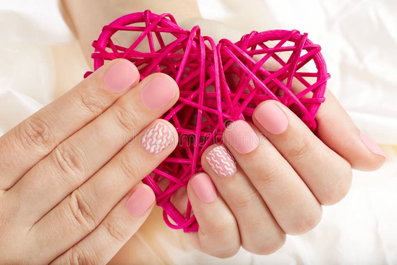 Hands with Pink Matte Manicured Nails Holding a Heart Stock Photo ...