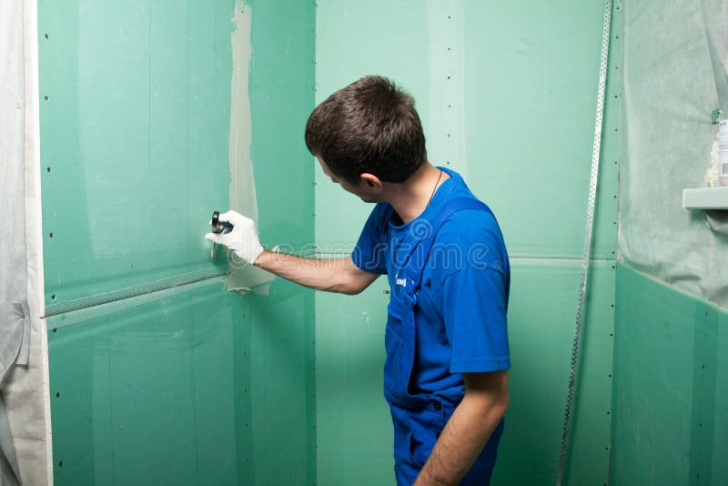 Hands Plasterer at Work. Application of the Plaster on the Wall Stock ...
