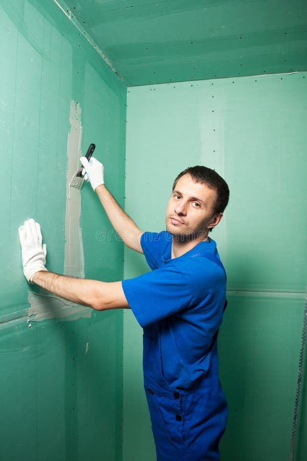 Hands Plasterer at Work. Application of the Plaster on the Wall Stock ...