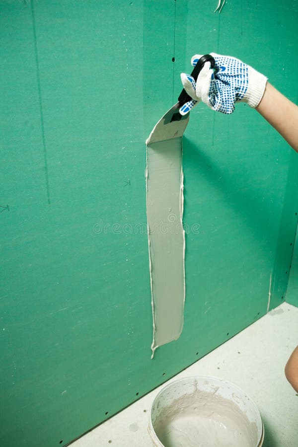 Hands Plasterer at Work. Application of the Plaster on the Wall Stock ...