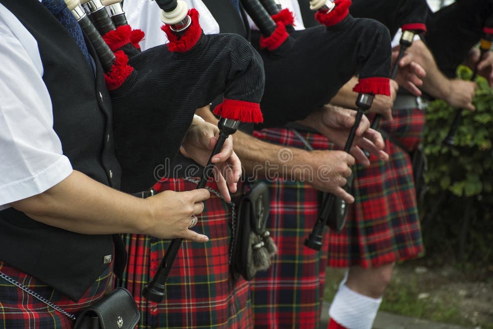 Hands play the bagpipes stock image. Image of hands, check - 62036823