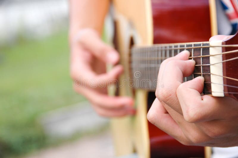 Hands play guitar stock image. Image of equipment, instrument - 35203461