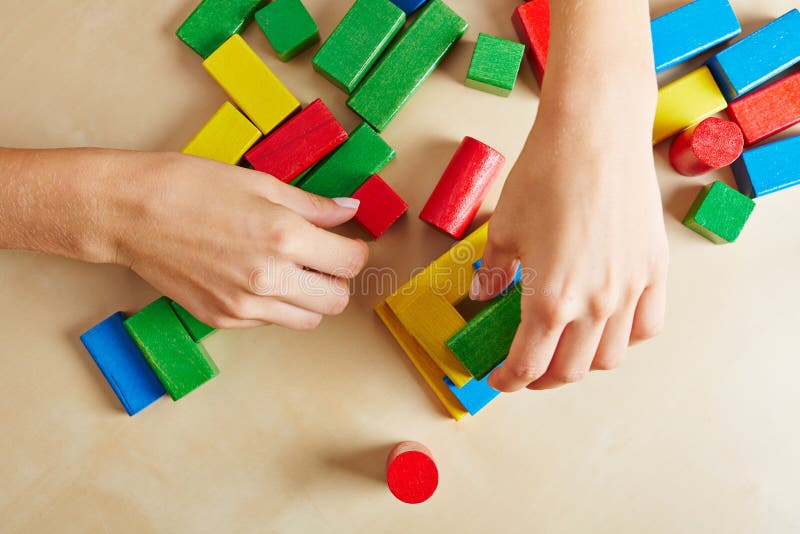 Hands Building Tower with Building Blocks Stock Photo - Image of stones ...
