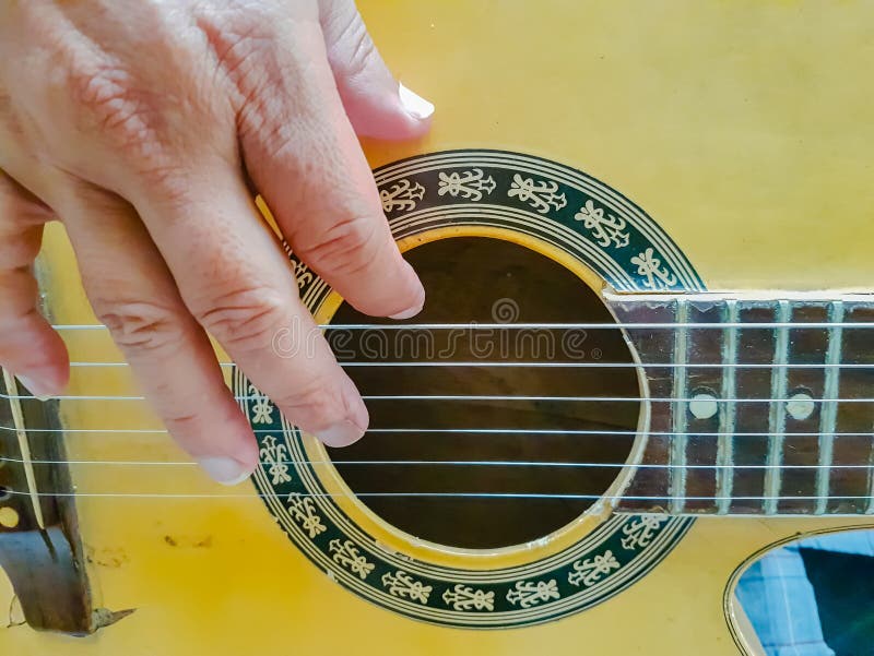 Hands playing guitar stock image. Image of classic, finger - 303236435