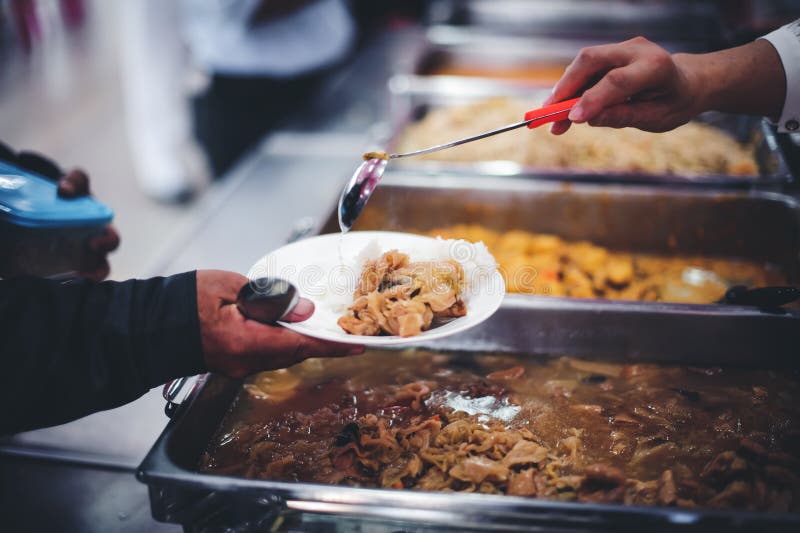 The Hands of the Poor Apply for Food from Rich People Who Donate Food ...