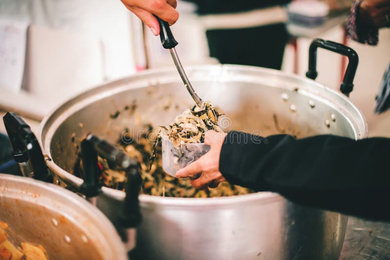 The Hands of the Poor Apply for Food from Rich People Who Donate Food ...