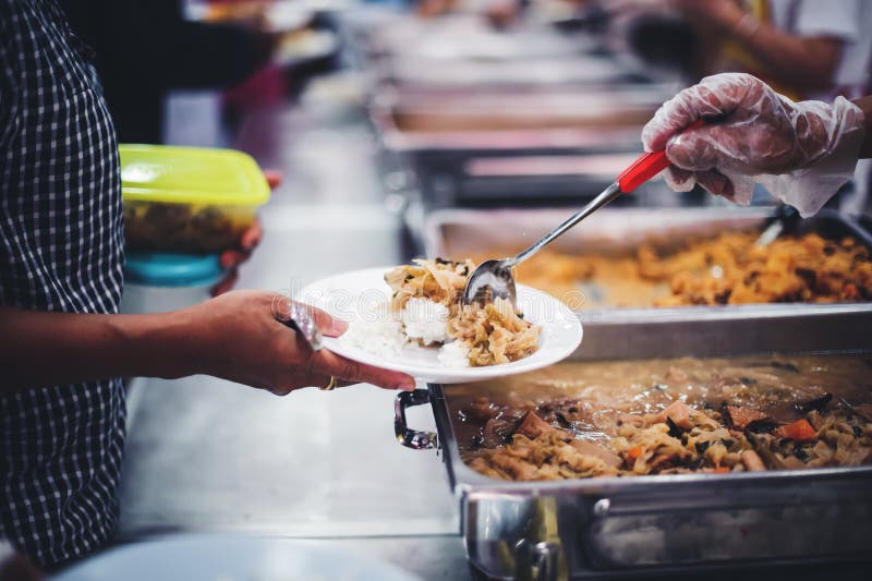 The Hands of the Poor Apply for Food from Rich People Who Donate Food ...