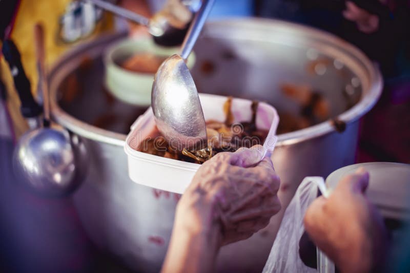 The Hands of the Poor Apply for Food from Rich People Who Donate Food ...
