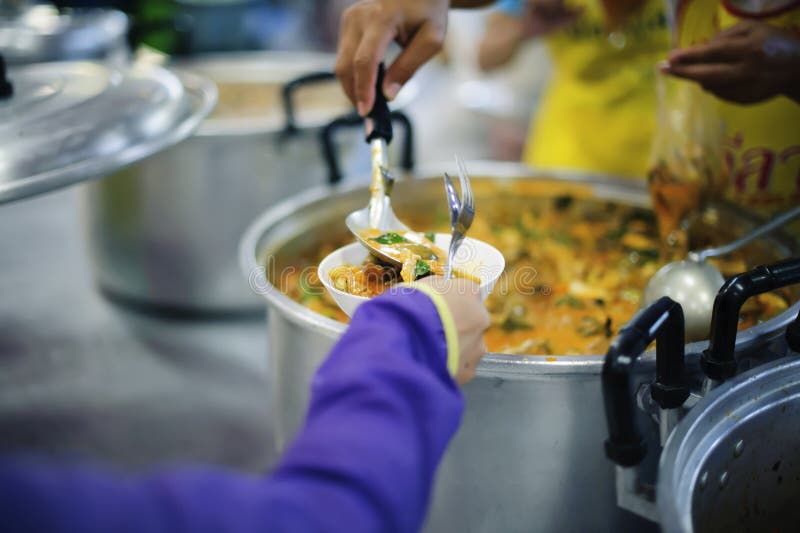 The Hands of the Poor Bring the Container To Fill the Food To Bring ...