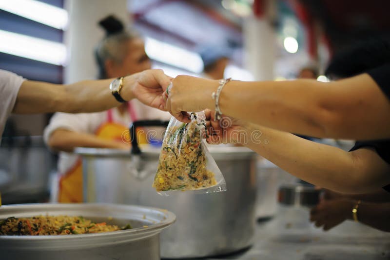 The Hands of the Poor Bring the Container To Fill the Food To Bring ...