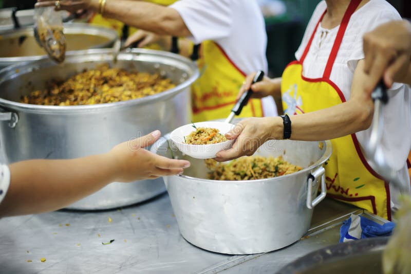 The Hands of the Poor Bring the Container To Fill the Food To Bring ...