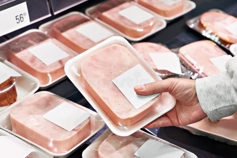 Hands with ham at store stock photo. Image of hand, slice - 270199650
