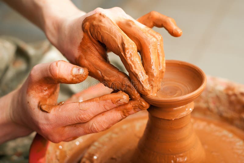 Hands of a Potter, Creating an Earthen Jar on the Circle Stock Photo ...