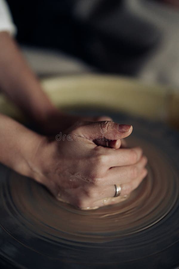 Hands of Potter Sculpt Handmade Earthenware on Pottery Wheel Stock ...