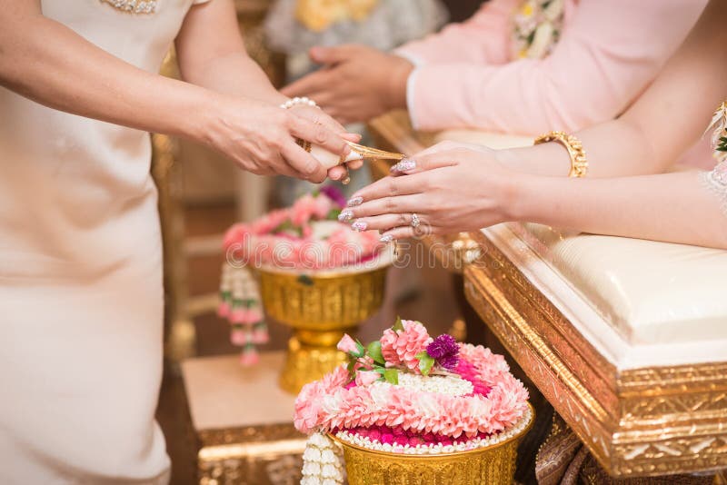 Hands Pouring Blessing Water into Bride S Bands, Thai Wedding Stock ...