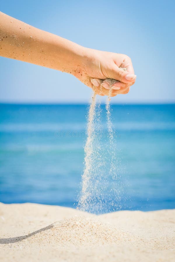 Hands are Pouring Sand by the Sea Stock Image - Image of beautiful ...