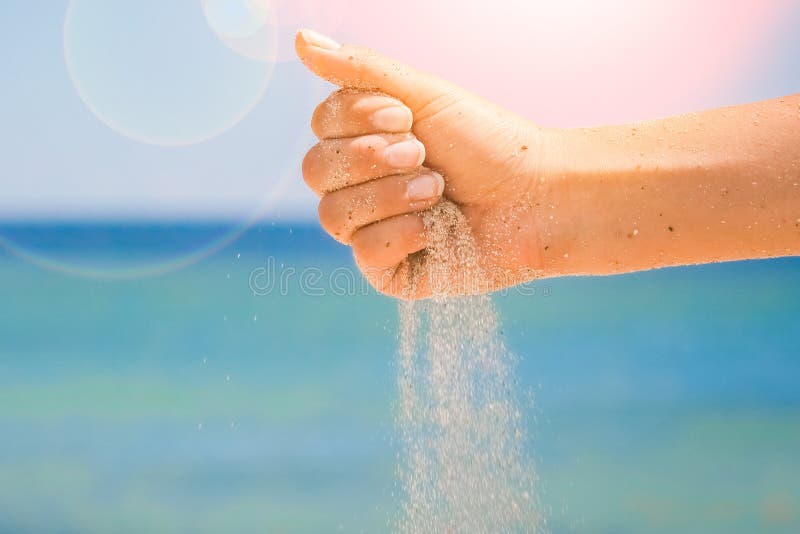 Hands are Pouring Sand by the Sea Stock Image - Image of white ...