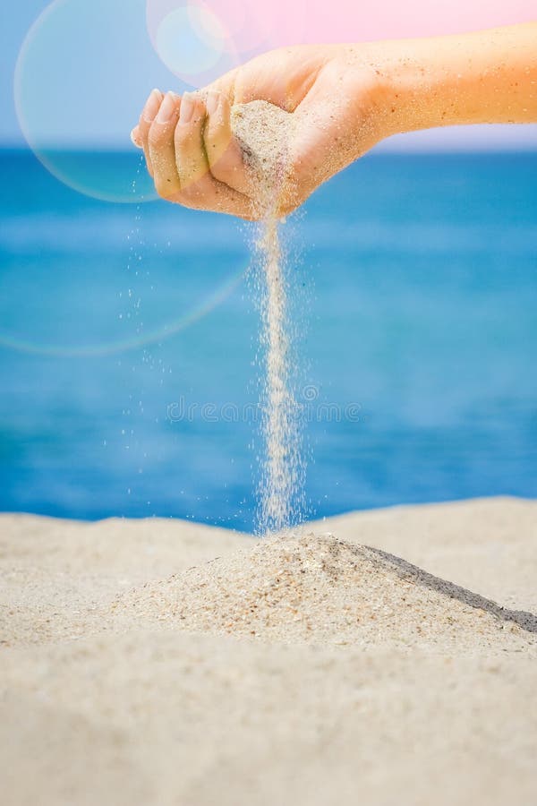Hands are Pouring Sand by the Sea Stock Photo - Image of beach, travel ...