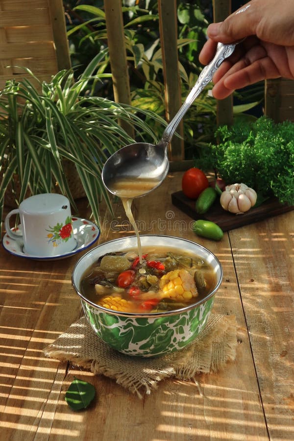 Hands Pouring Vegetable Soup with a Spoon Stock Image - Image of food ...