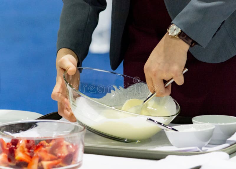 Hands Preparing Cream, Chef Whisking Cream in Kitchen Stock Image ...
