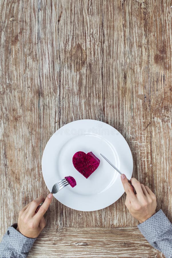 Hands Preparing To Eat Heart on the Plate Stock Photo - Image of meal ...
