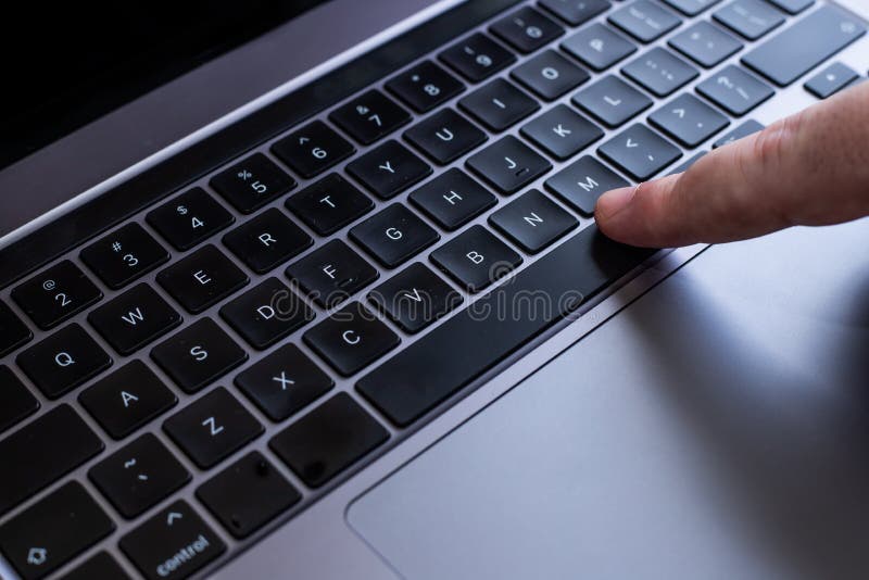 Hands Pressing Computer Keyboard Keys while Writing with Pencil in ...